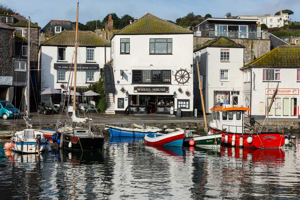 wheelhouse-restaurant-with-boats-in-front - Wheelhouse Restaurant